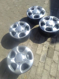 Mahindra 4 rims and covers | Brits | Gumtree South Africa