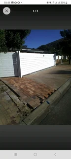 Polyplank and nutec cladding on existing Palisade fencing and gates ...