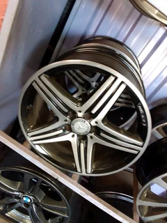 A set of 18inches OEM AMG mags 5x112 pcd narrow and wide for mercedes ...