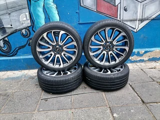 Set of 22inches original mags 5x120 pcd with continental tyres for land ...