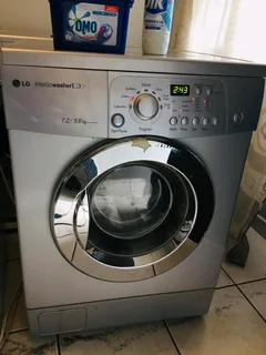 SILVER LG DIRECT DRIVE FRONT LOADER WASHER AND DRYER COMBO MACHINE ...